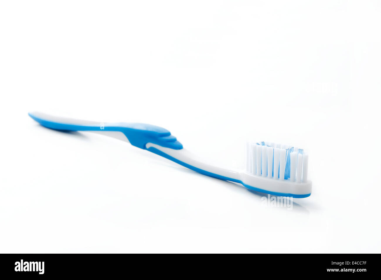 Close up white toothbrush Cut Out Stock Images & Pictures - Alamy