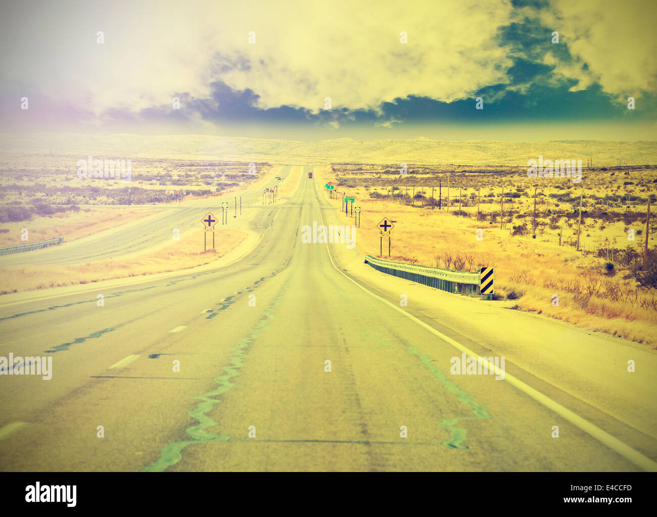 Endless country highway, vintage retro effect Stock Photo - Alamy