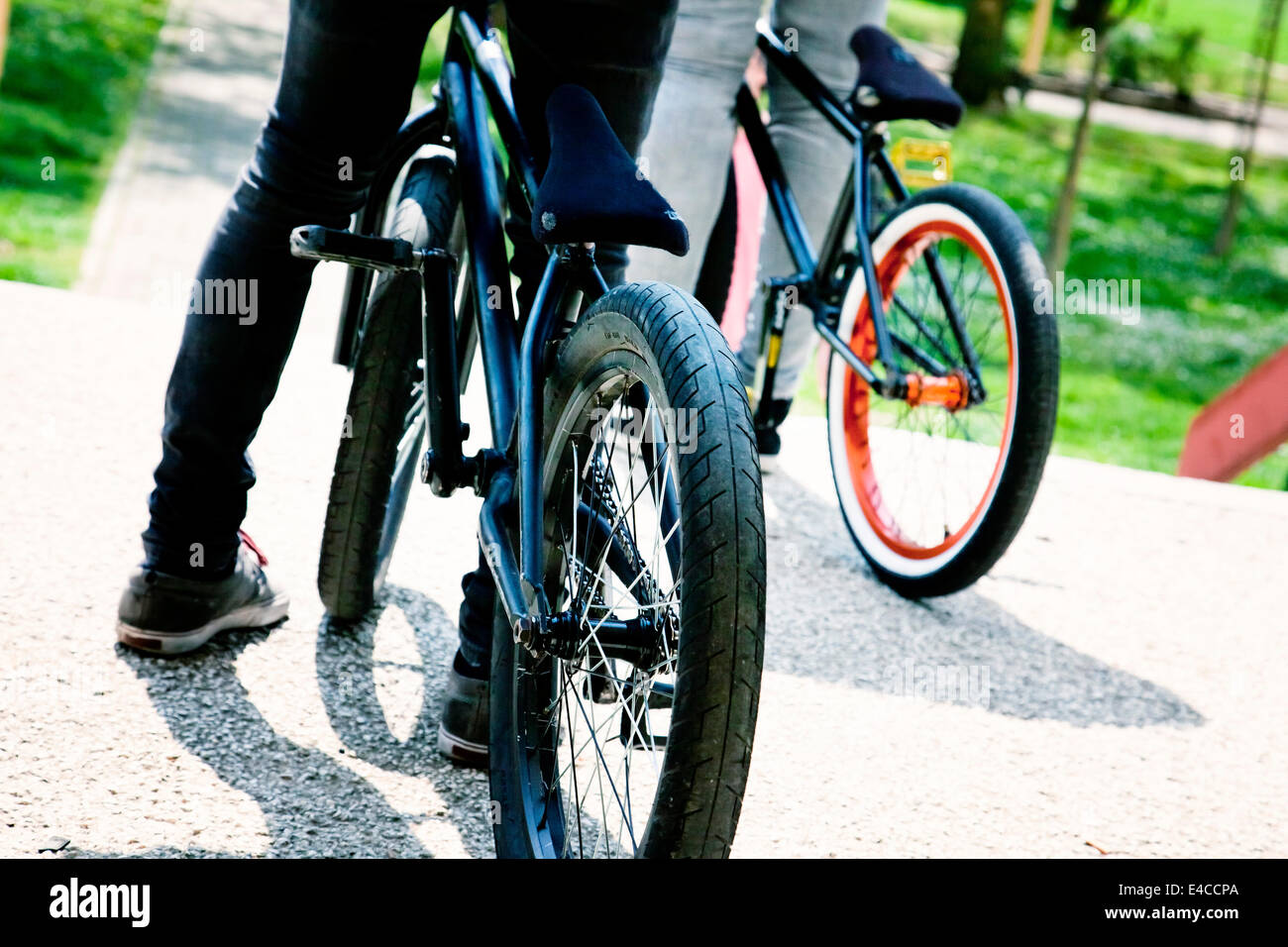 Low section view of BMX bikers Stock Photo - Alamy