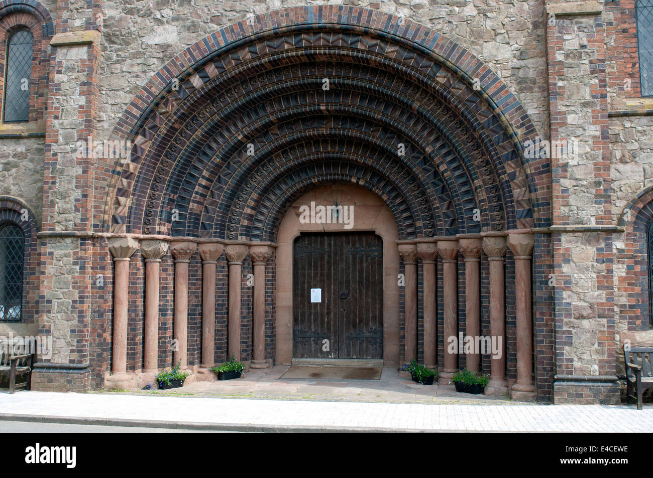 The West Door of Holy Trinity Church, Hartshill, Warwickshire, UK Stock ...