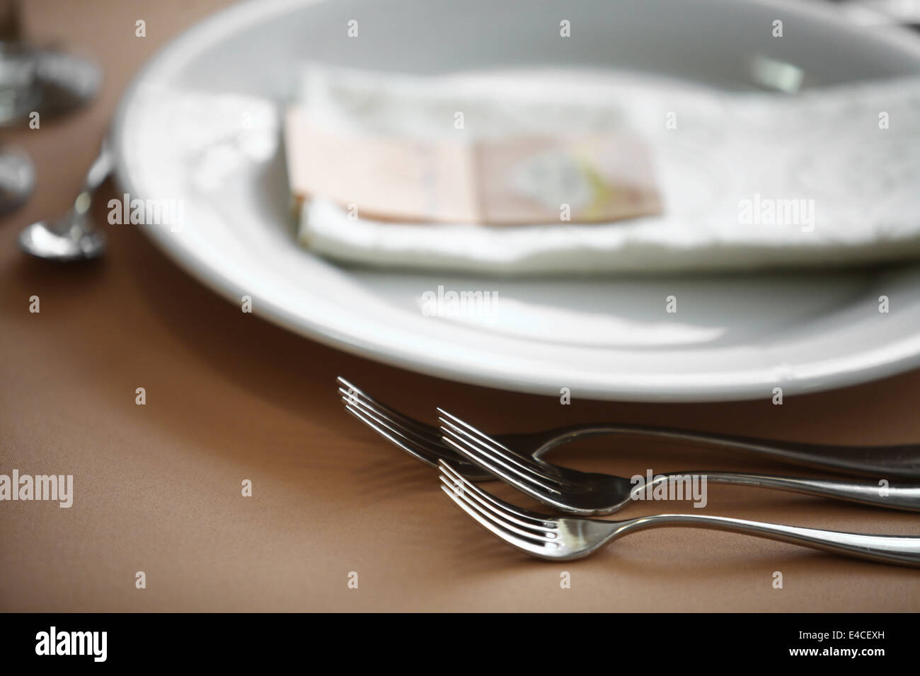 Shot with a dinner table in a restaurant Stock Photo - Alamy