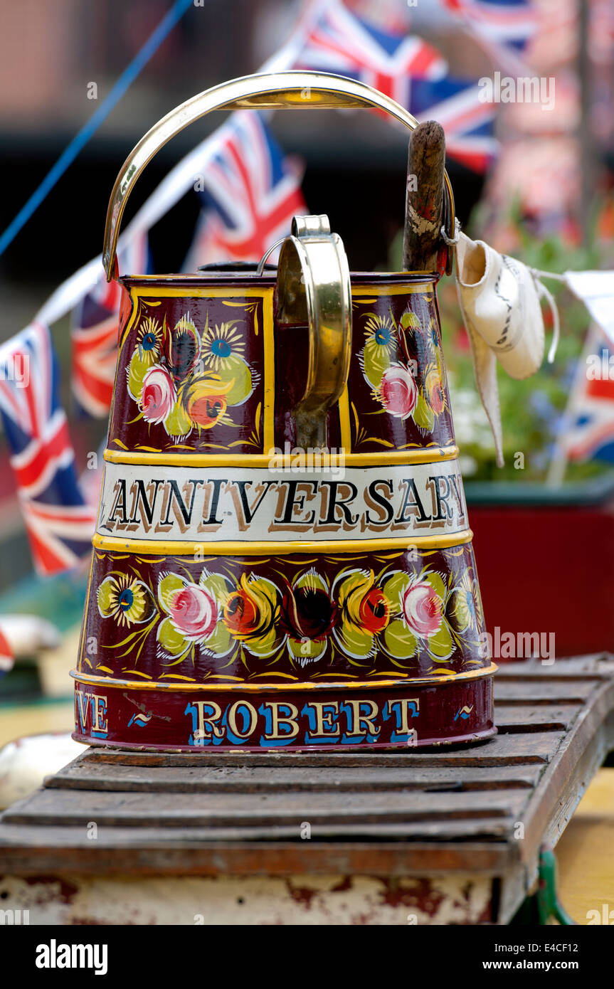 Painted Buckby can on a narrowboat Stock Photo - Alamy