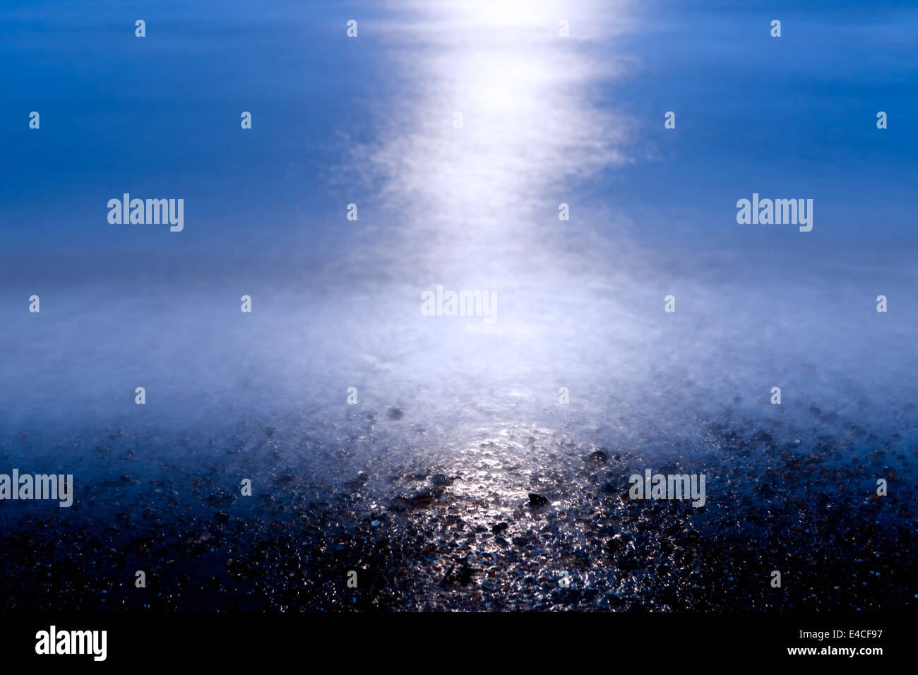 Moon setting over ocean beach hi-res stock photography and images - Alamy