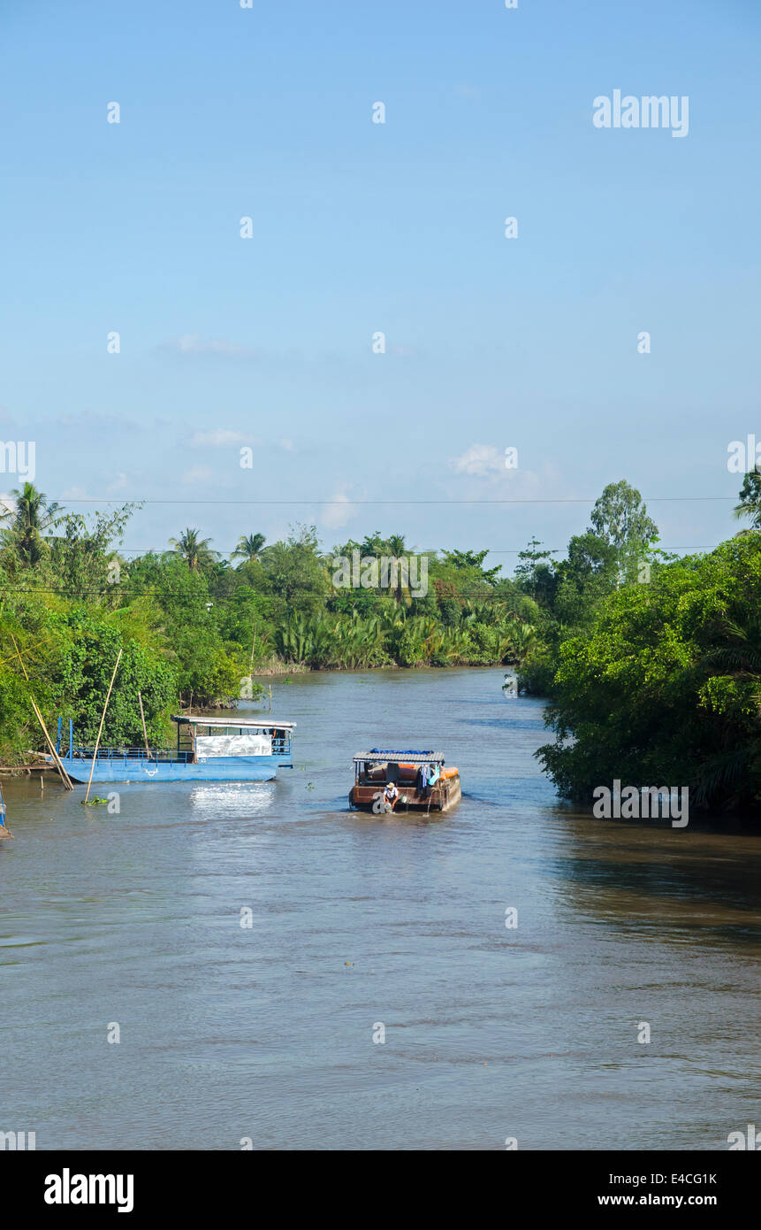 Boat going down the river hi-res stock photography and images - Alamy