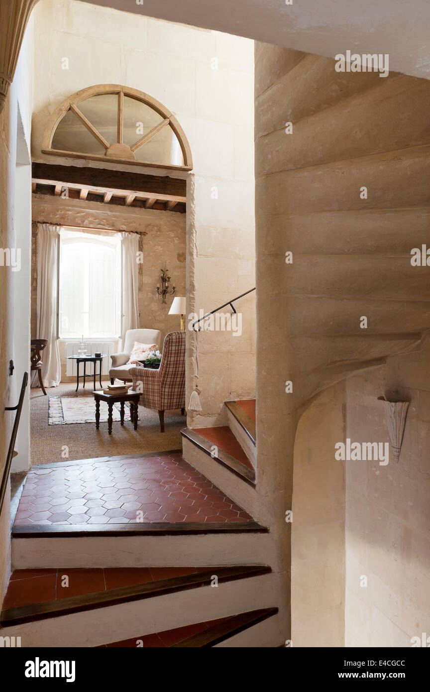 Terracotta hexagonal tiles on curved stone staircase Stock Photo - Alamy