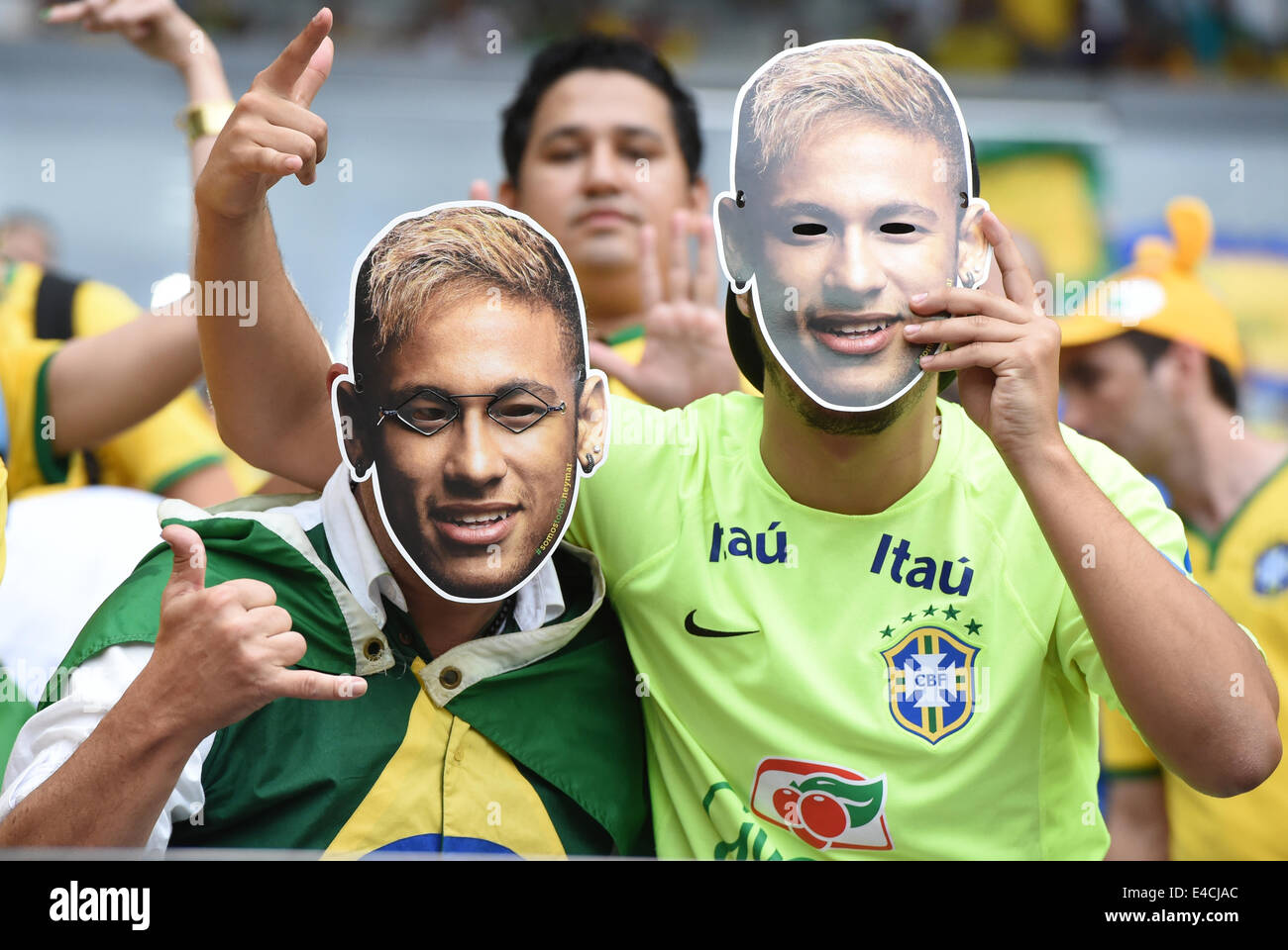 Belo Horizonte, Brazil. 08th July, 2014. Supporters of Brazil pose with ...