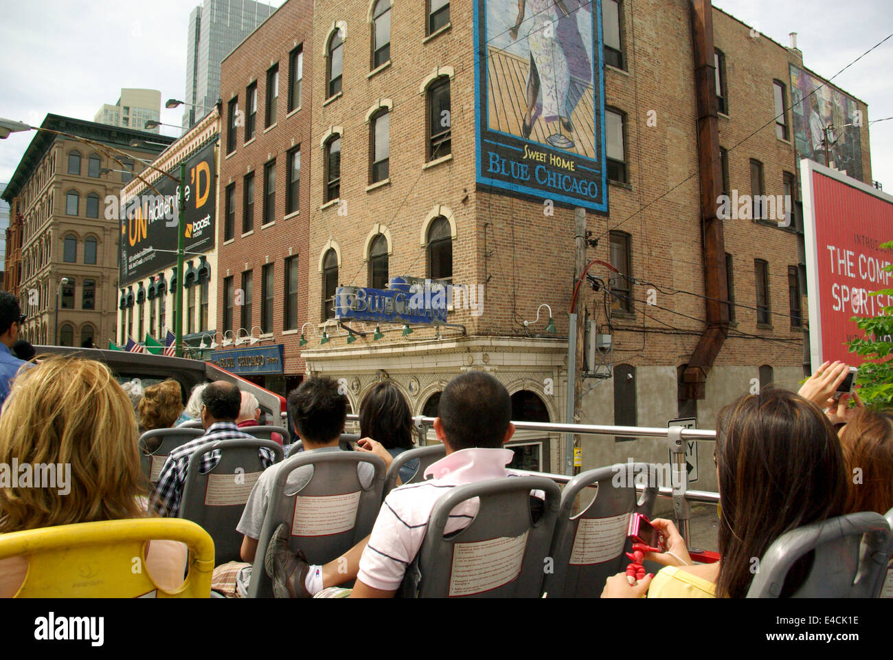 Group of people taking a tour around Chicago on a open topped bus Stock ...