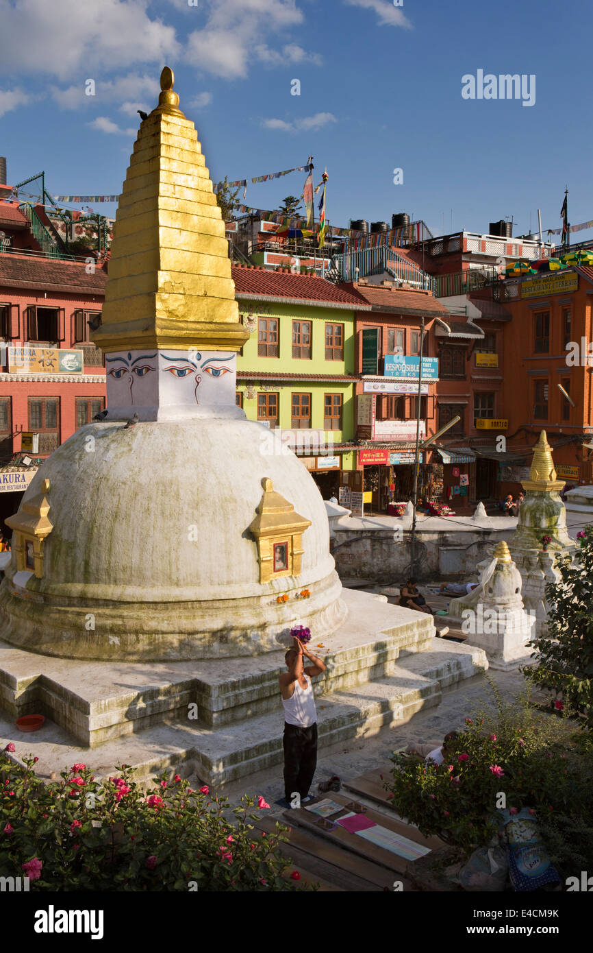 Nepal, Kathmandu, Boudhanath, Man praying at Old Dabzang Rinpoche Gompa ...