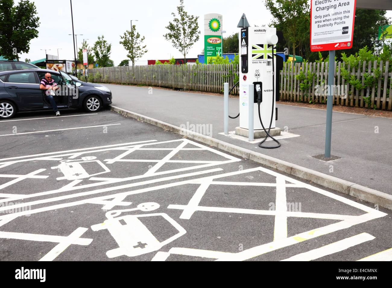 An Ecotricity electric vehicle charging point with a BP sign showing ...