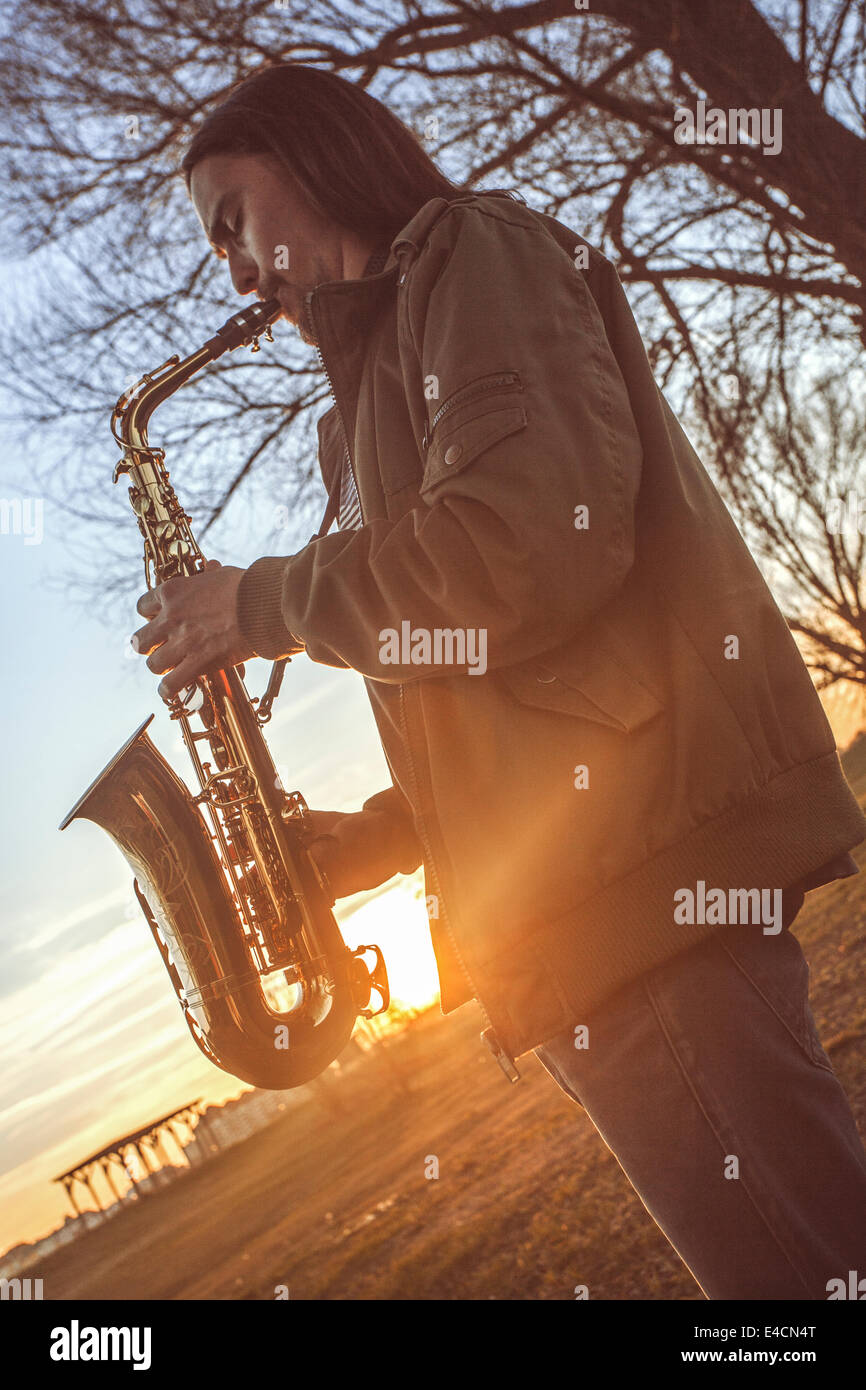 Playing sunset hi-res stock photography and images - Alamy