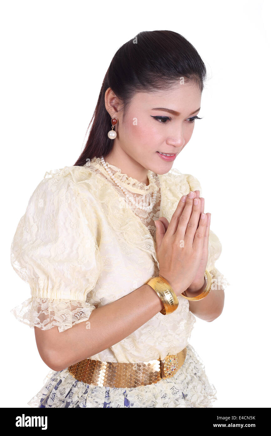 woman wearing typical thai dress pay respect isolated on white ...