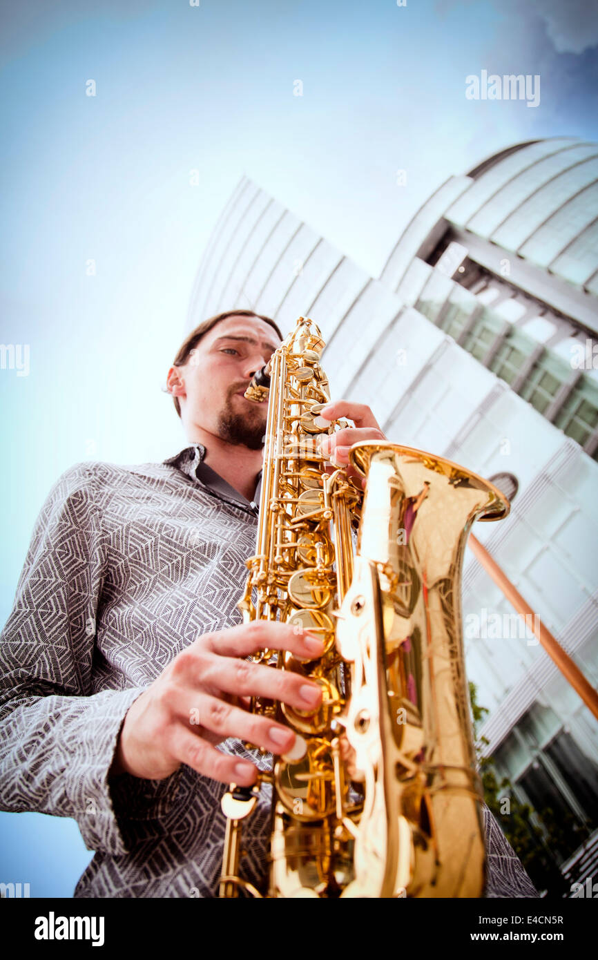 Blowing into saxophone hi-res stock photography and images - Alamy