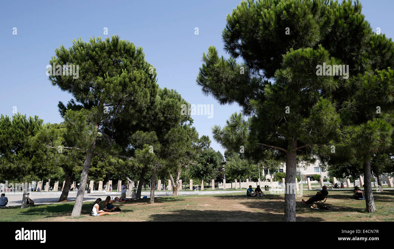 People relax under the trees in White Tower Square, Thessaloniki ...