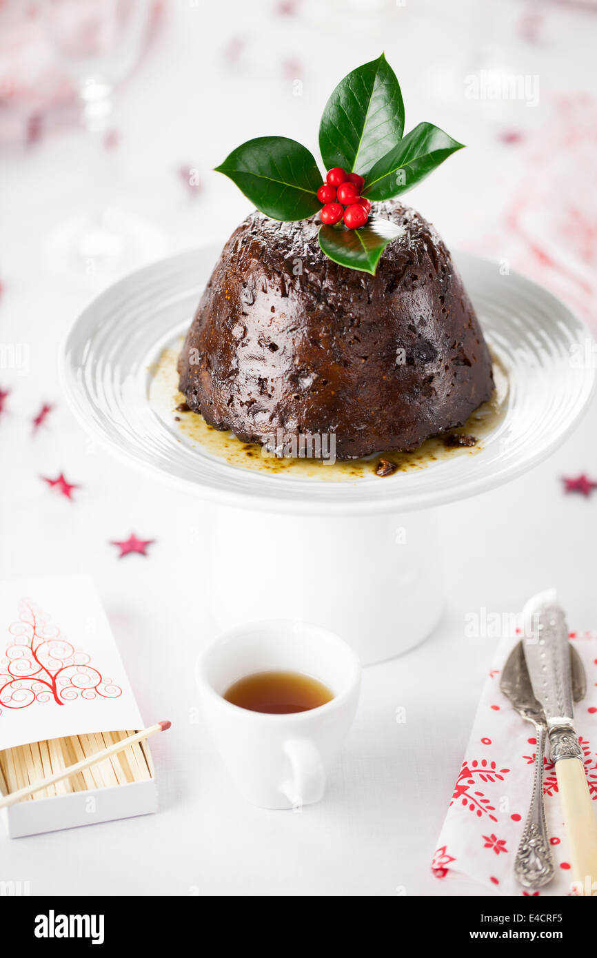 Christmas Pudding with brandy on a cake stand Stock Photo - Alamy