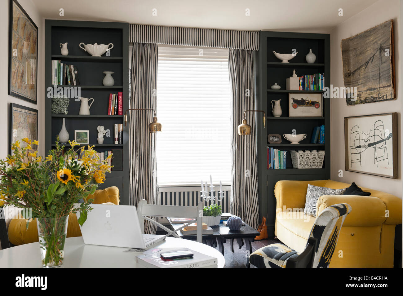 Victorian buttoned sofas upholstered in Romo Lucien yellow velvet in ...