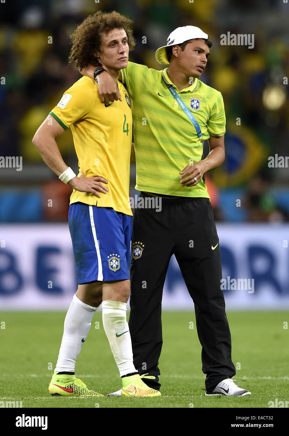 Belo Horizonte, Brazil. 8th July, 2014. Brazil's David Luiz (L) is ...