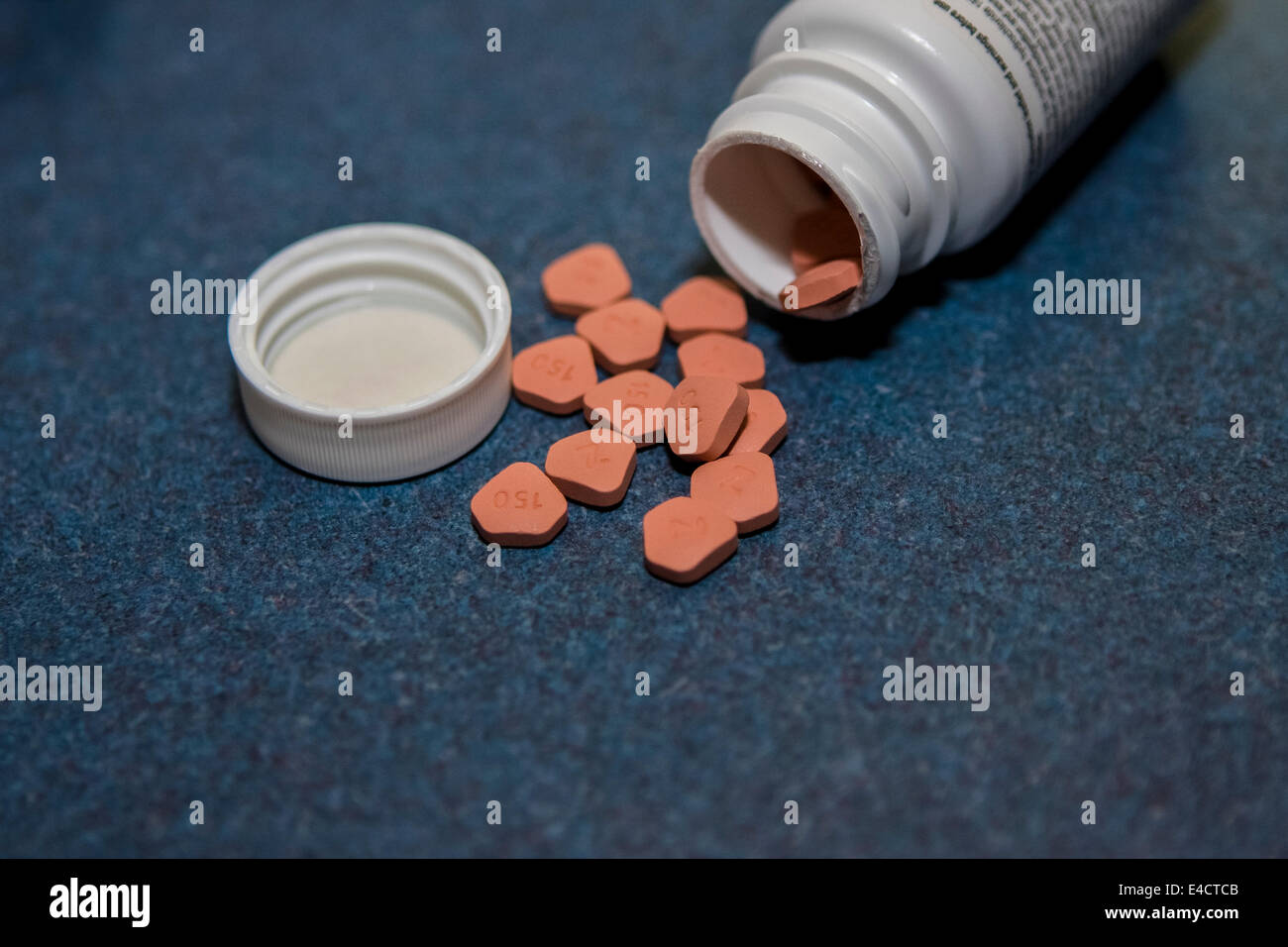 Open Medication Bottle with Pills Spilled on the Counter Stock Photo ...