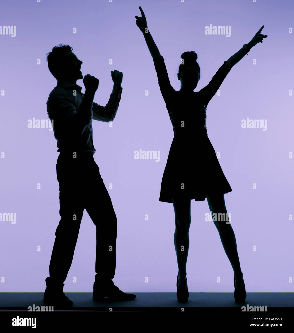 Joyful young people dancing together Stock Photo - Alamy