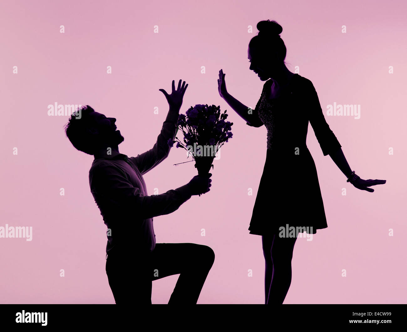 Spectacular proposal with the bouquet of the red roses Stock Photo - Alamy