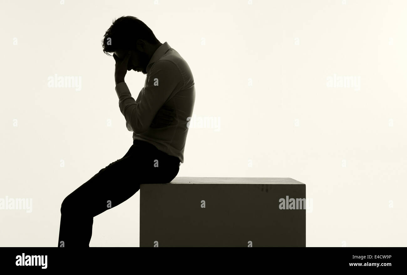 Frustrated young businessman in the very bad mood Stock Photo - Alamy