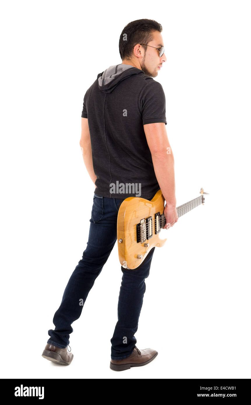 young guy holding electric guitar Stock Photo - Alamy