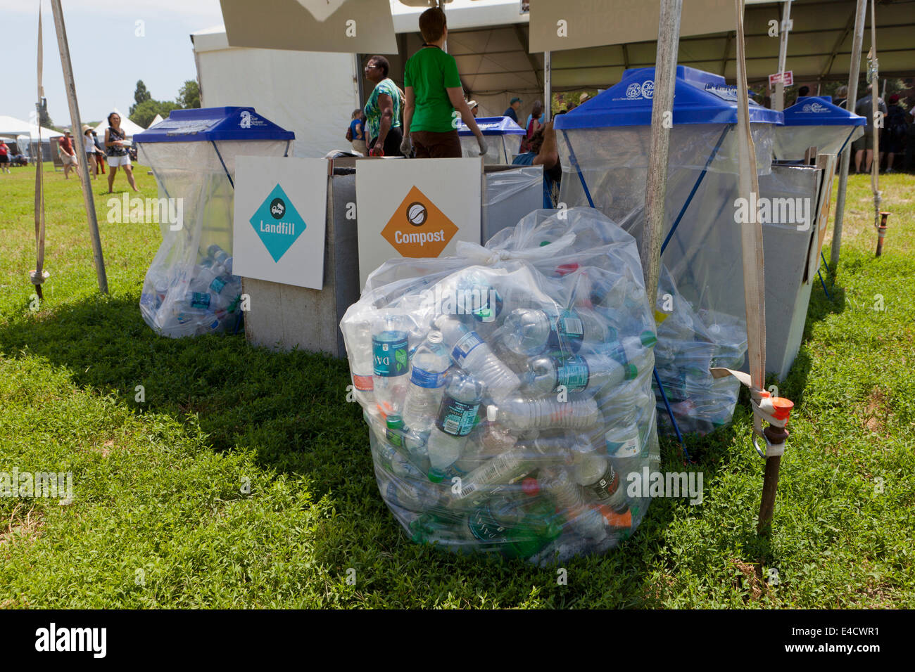 Recycling and composting campaign tent at an outdoor festival ...