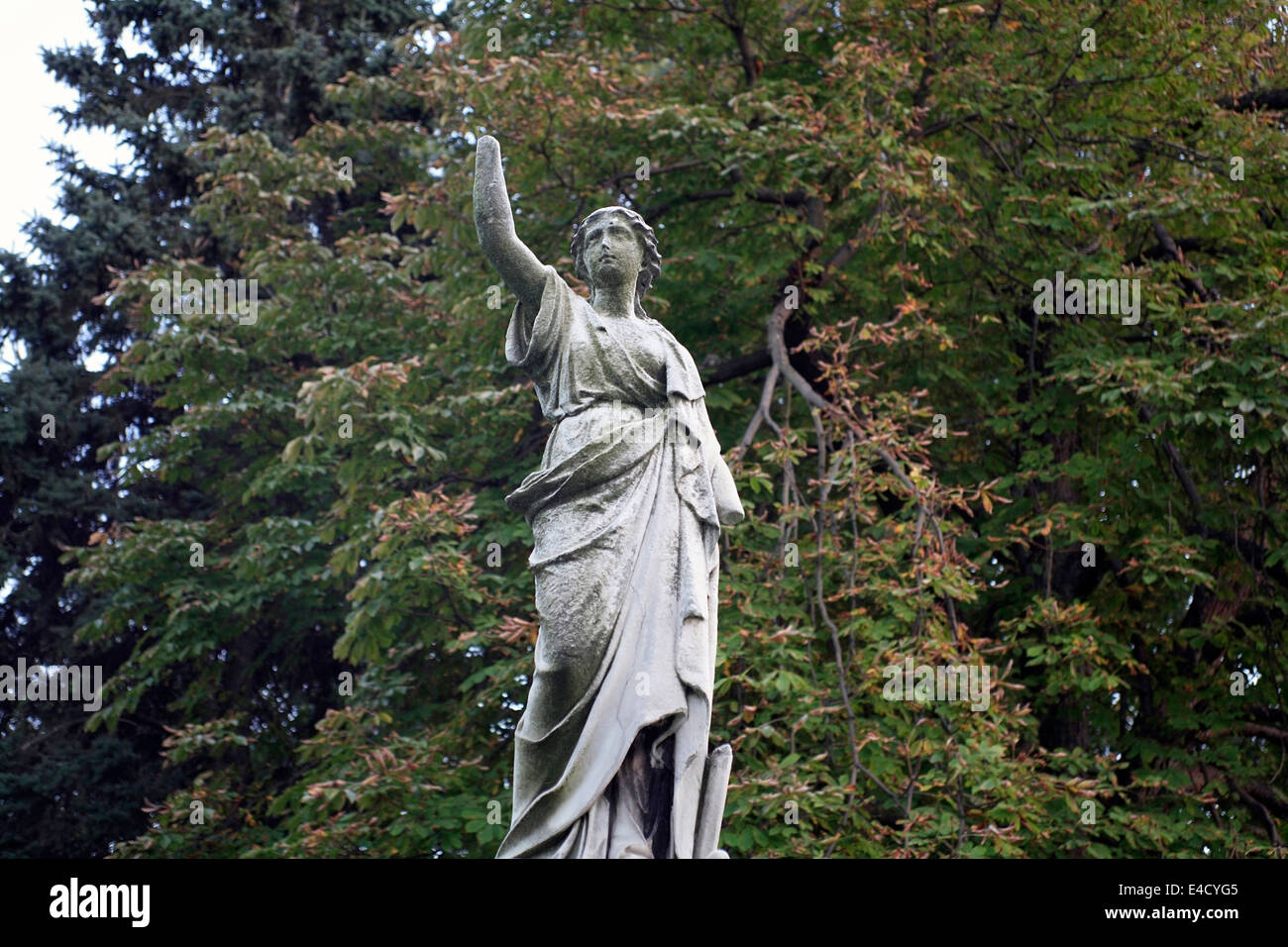 Statue of classical greek or roman dressed woman in historic Cemetery ...