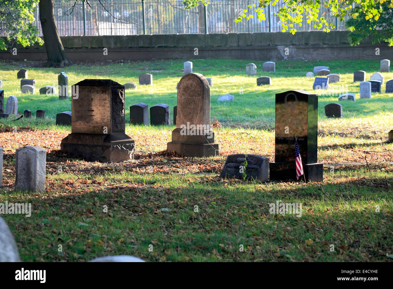 Several graves inside an old historic cemetery Stock Photo - Alamy