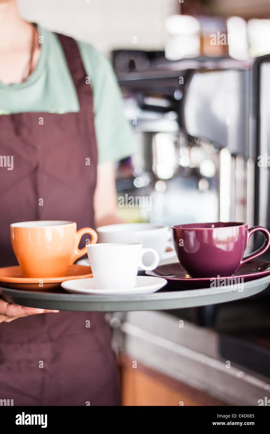 Barista serving set of freshly brewed coffee, stock photo Stock Photo ...