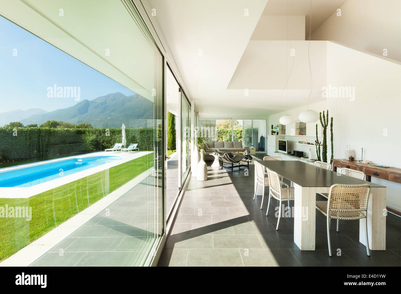 Modern villa, interior, dining table view Stock Photo - Alamy
