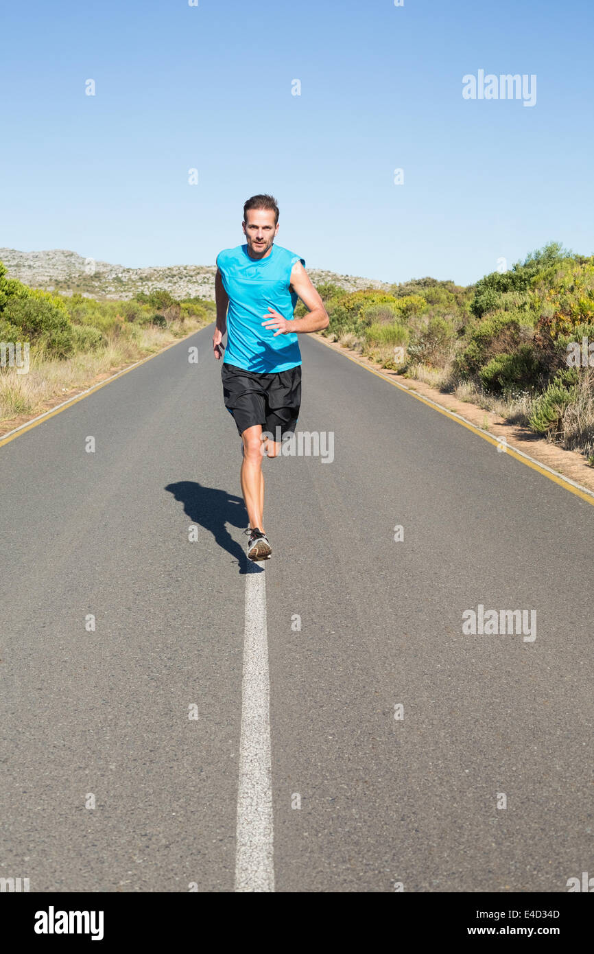 Handsome fit muscular man running hi-res stock photography and images ...