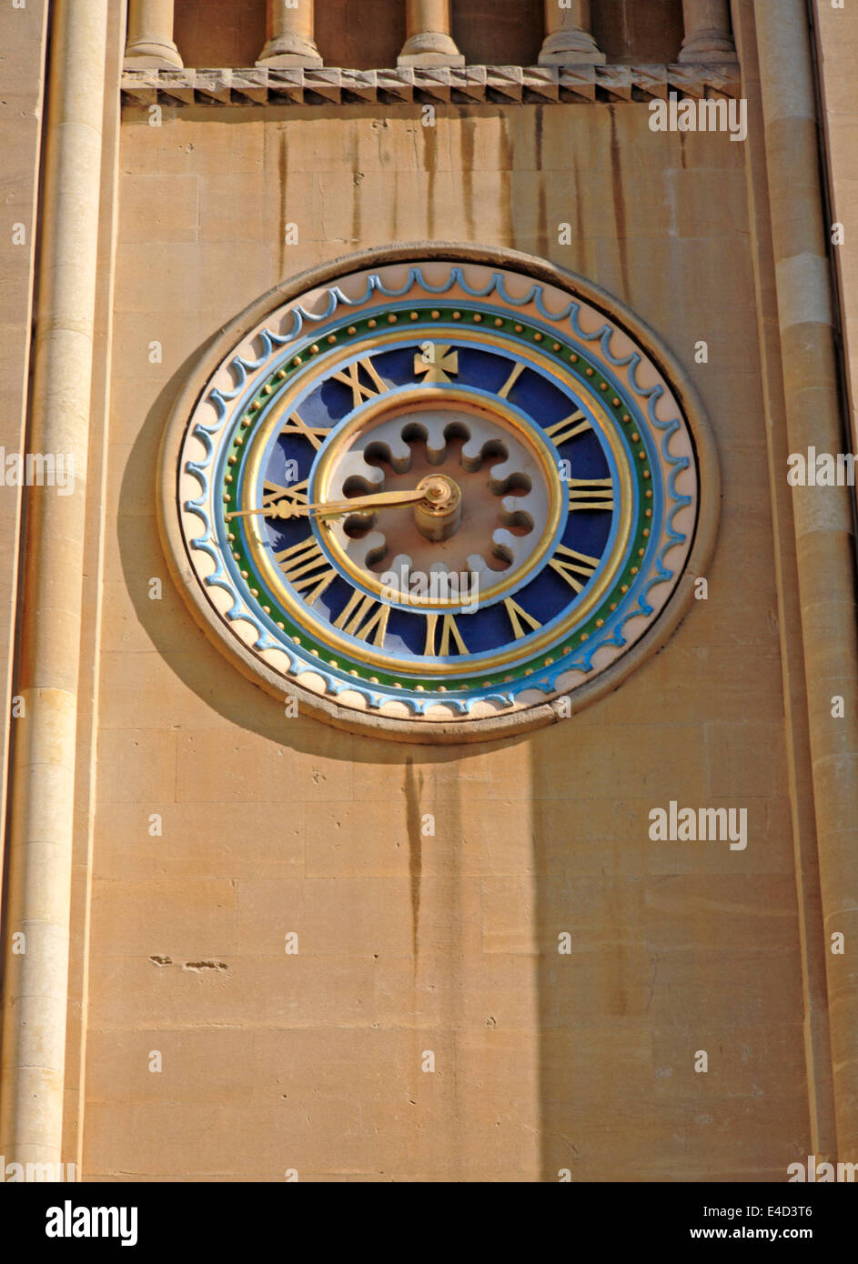A view of the clock on the south transept of Norwich Cathedral, Norfolk ...
