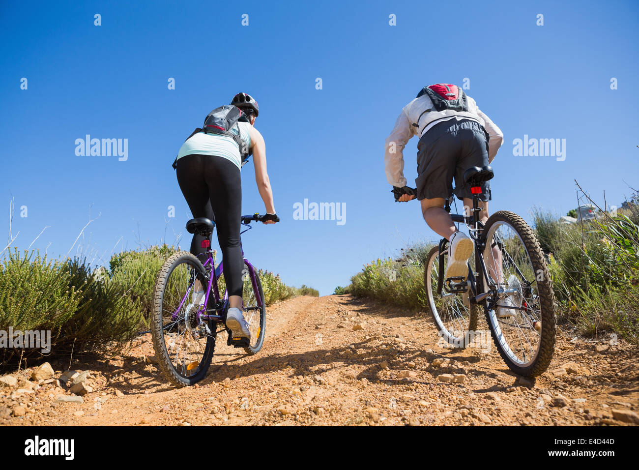 Man riding bicycle uphill on hi-res stock photography and images - Alamy