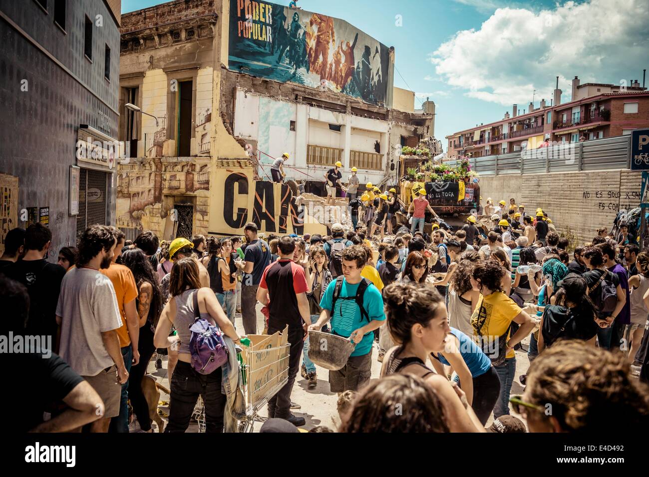 Barcelona, Spain. 31st May, 2014. Activists work the reconstruction of ...