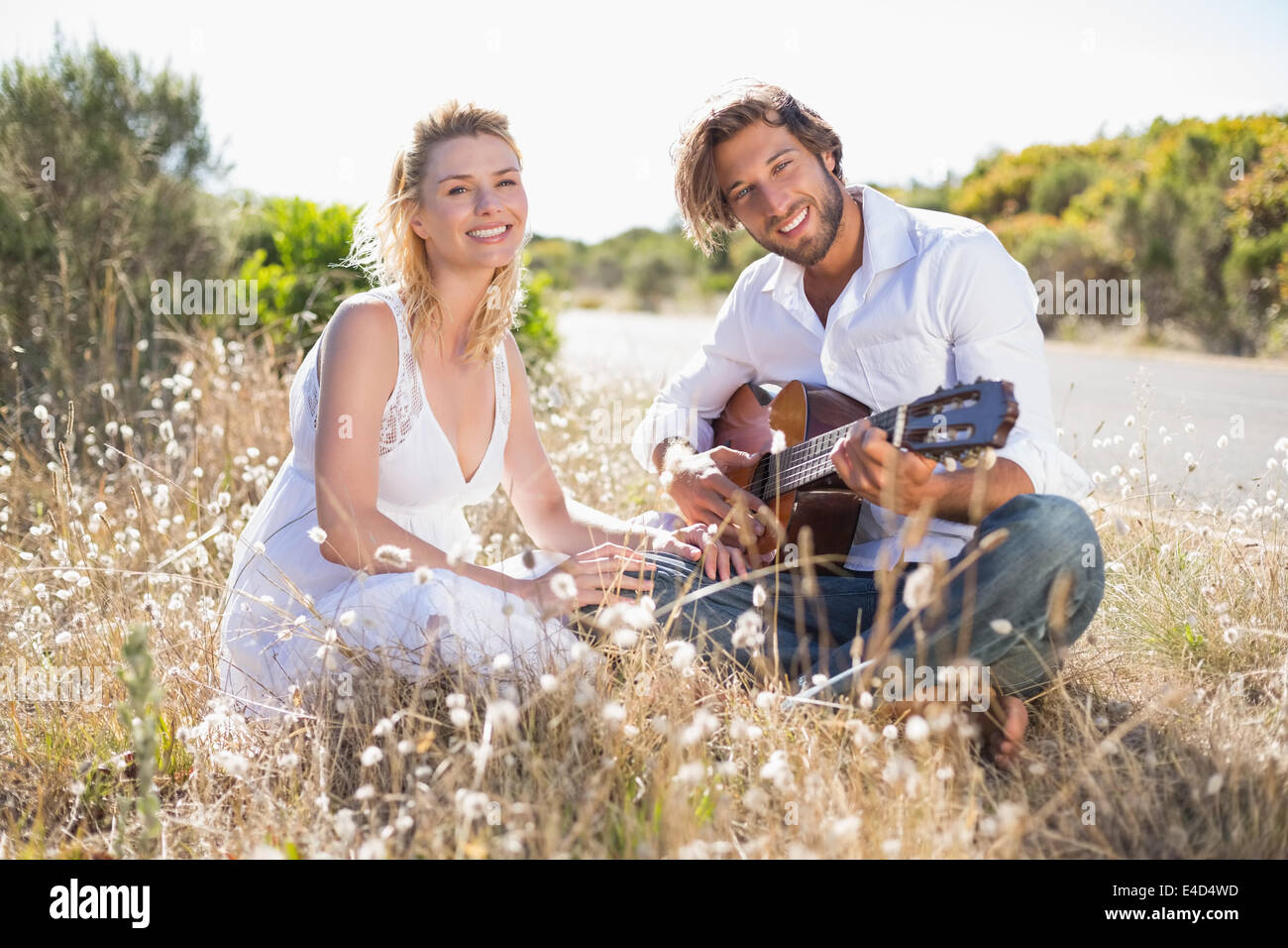 Man serenading woman hi-res stock photography and images - Alamy