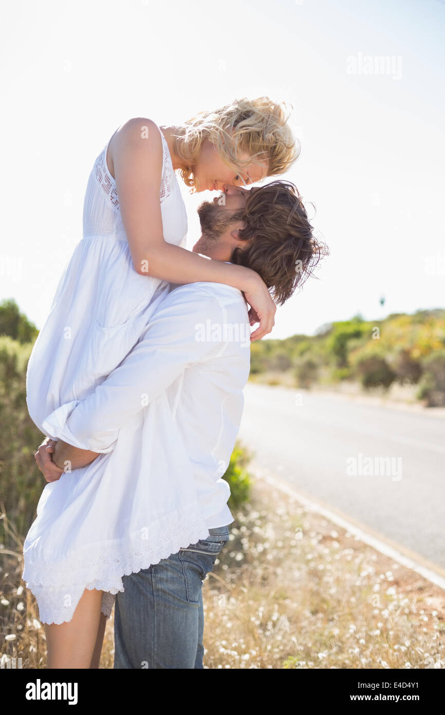 Man lifting woman up hi-res stock photography and images - Alamy