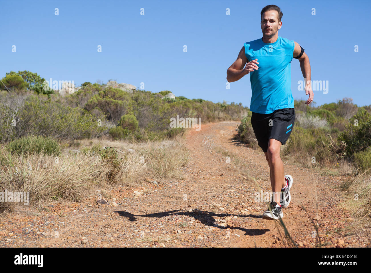 Fit man jogging on path hi-res stock photography and images - Alamy