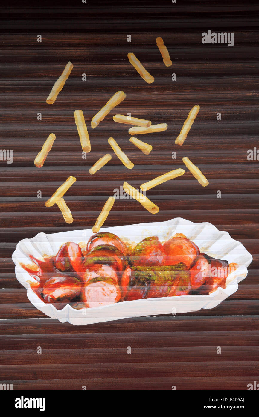A currywurst and fries on a fast food kiosk in Berlin, Germany Stock ...