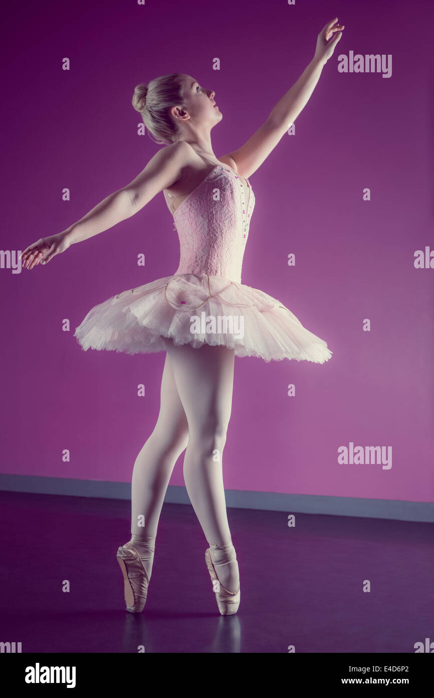 Graceful ballerina dancing en pointe Stock Photo - Alamy
