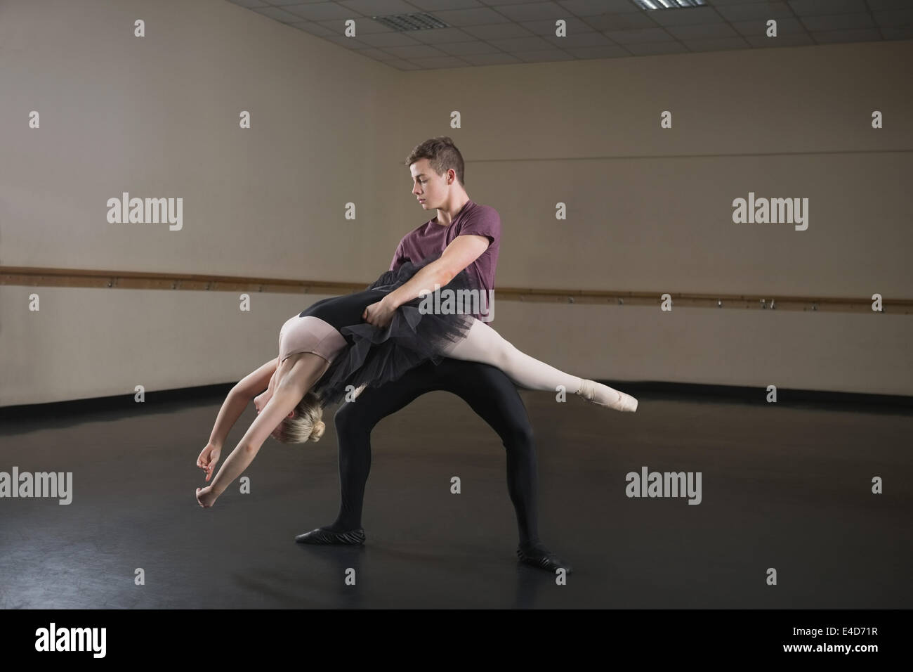 Ballet partners dancing gracefully together Stock Photo - Alamy