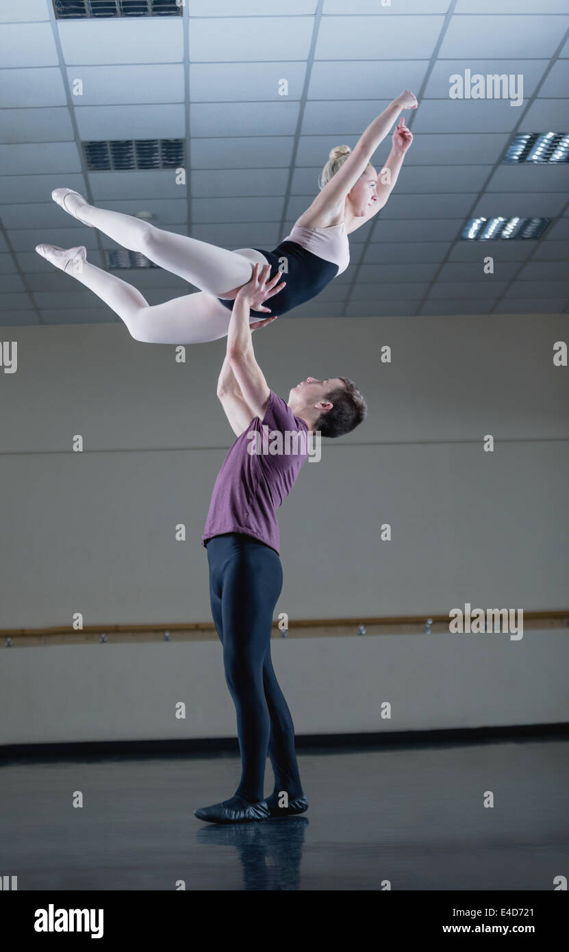 Ballet partners dancing gracefully together Stock Photo - Alamy