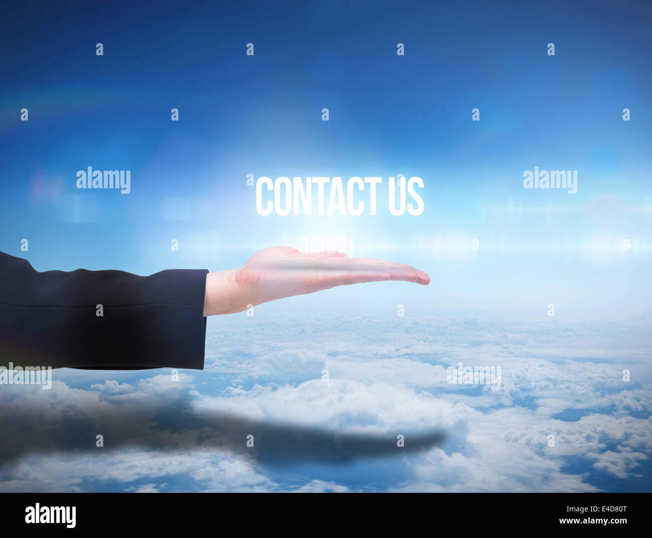 Businesswomans hand presenting the word contact us Stock Photo - Alamy
