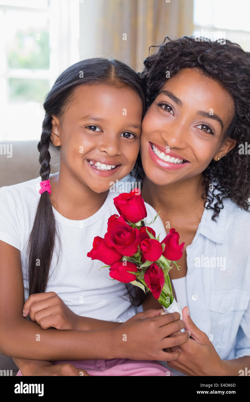 Portrait smiling girl holding roses hi-res stock photography and images ...