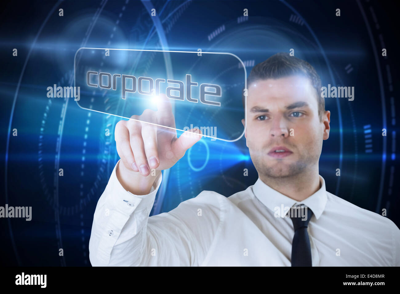 Businessman pointing to word corporate Stock Photo - Alamy