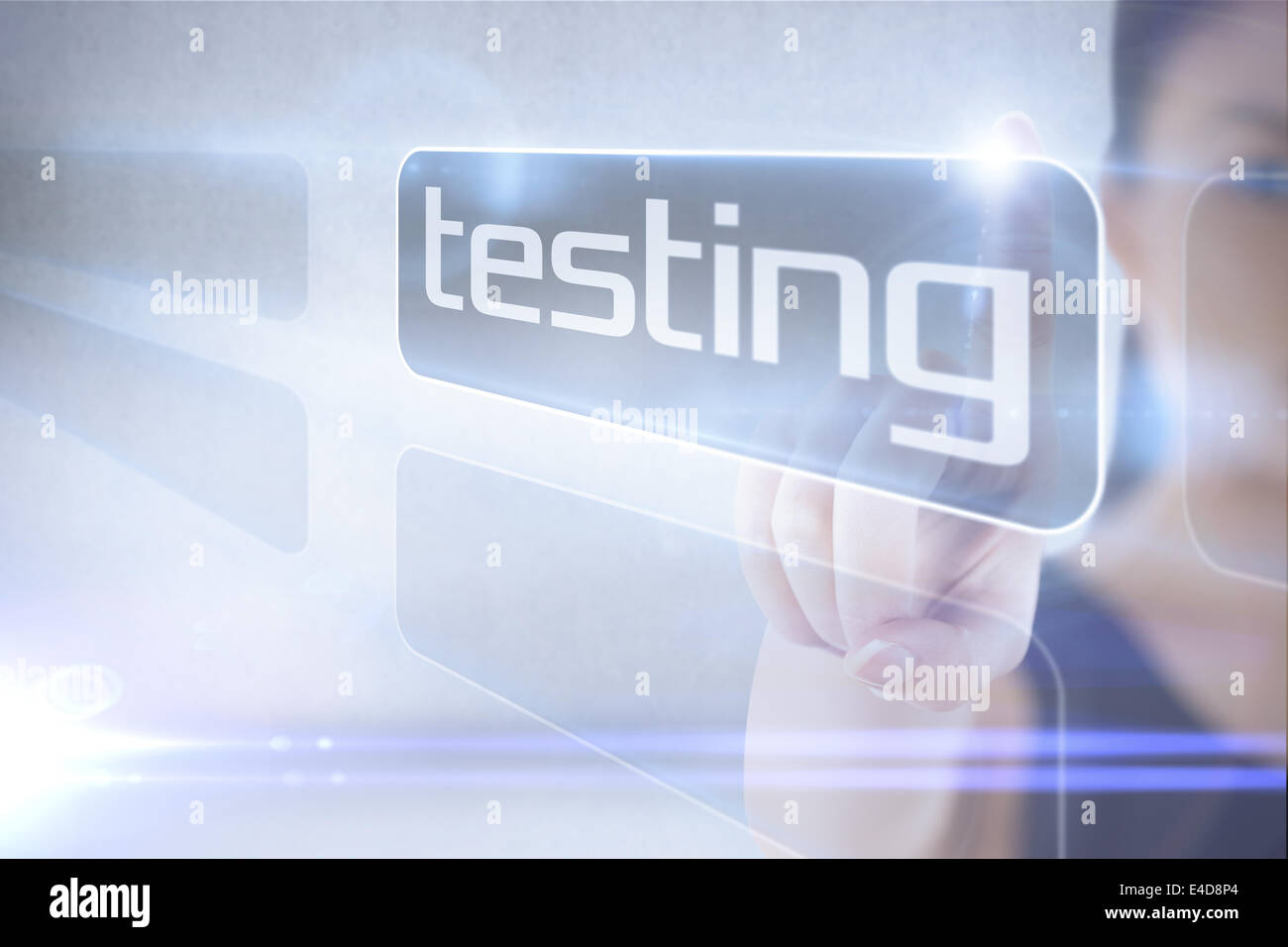 Businesswoman pointing to word testing Stock Photo - Alamy