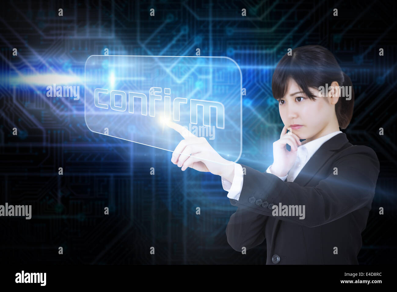 Businesswoman pointing to word confirm Stock Photo - Alamy