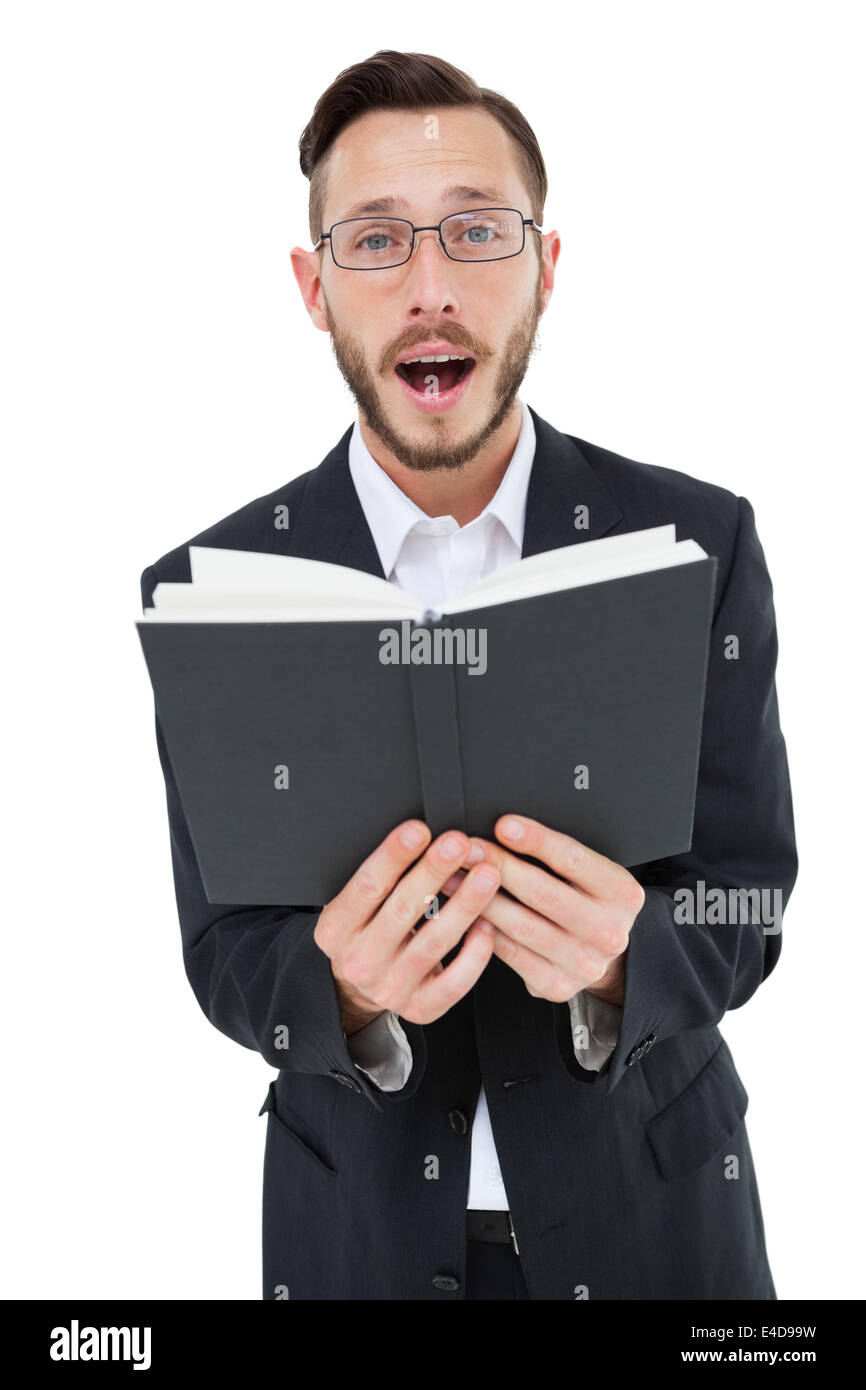 Young preacher reading from bible Stock Photo - Alamy