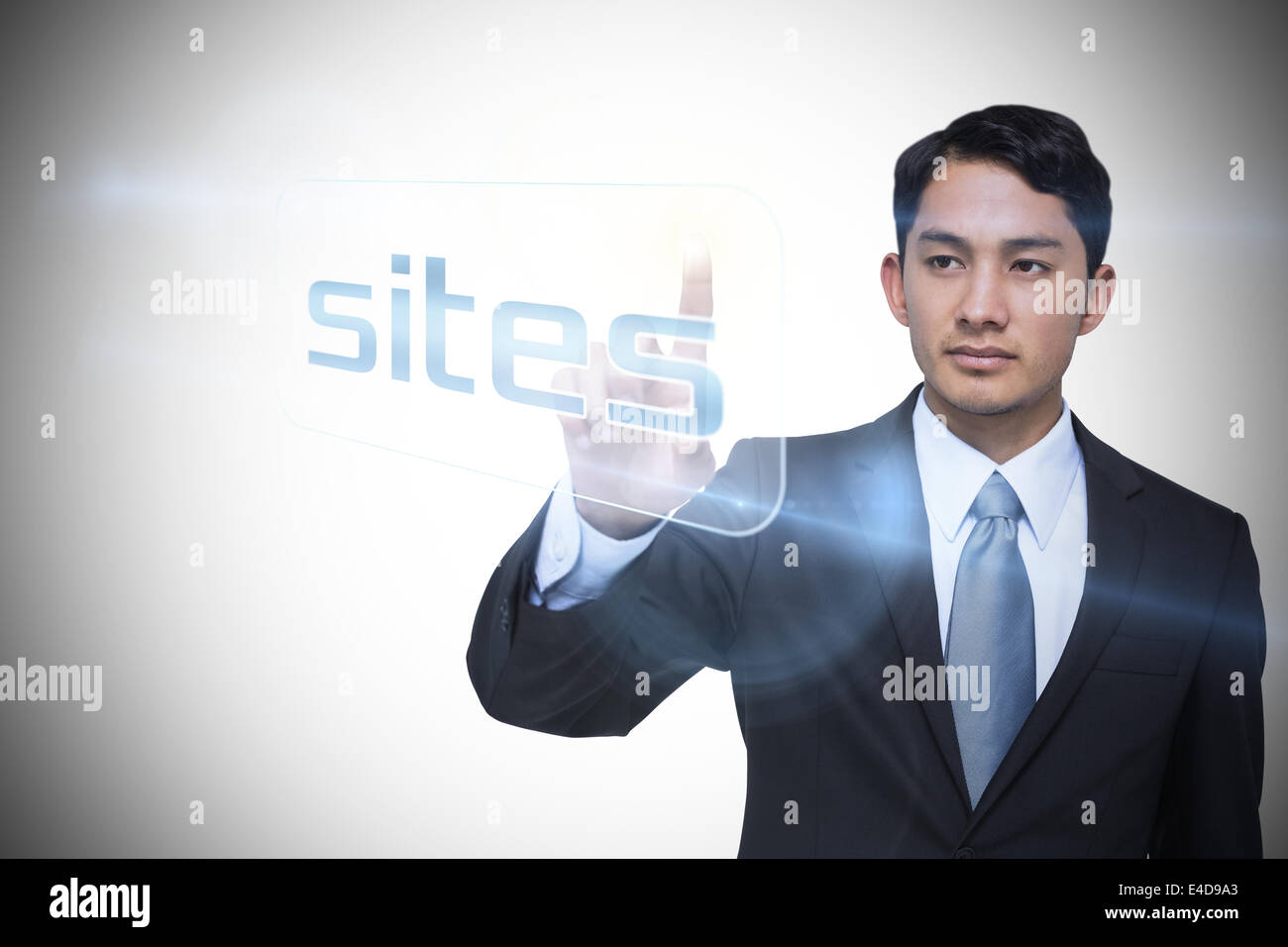 Businessman pointing to word sites Stock Photo - Alamy