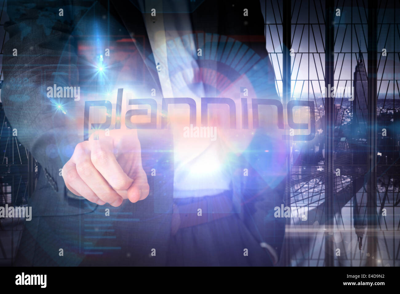 Businessman presenting the word planning Stock Photo - Alamy