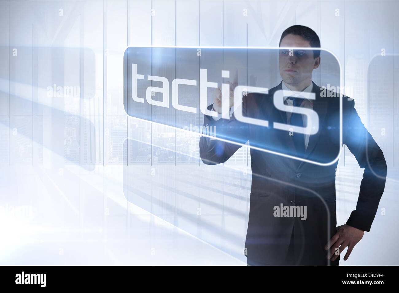 Businessman presenting the word tactics Stock Photo - Alamy